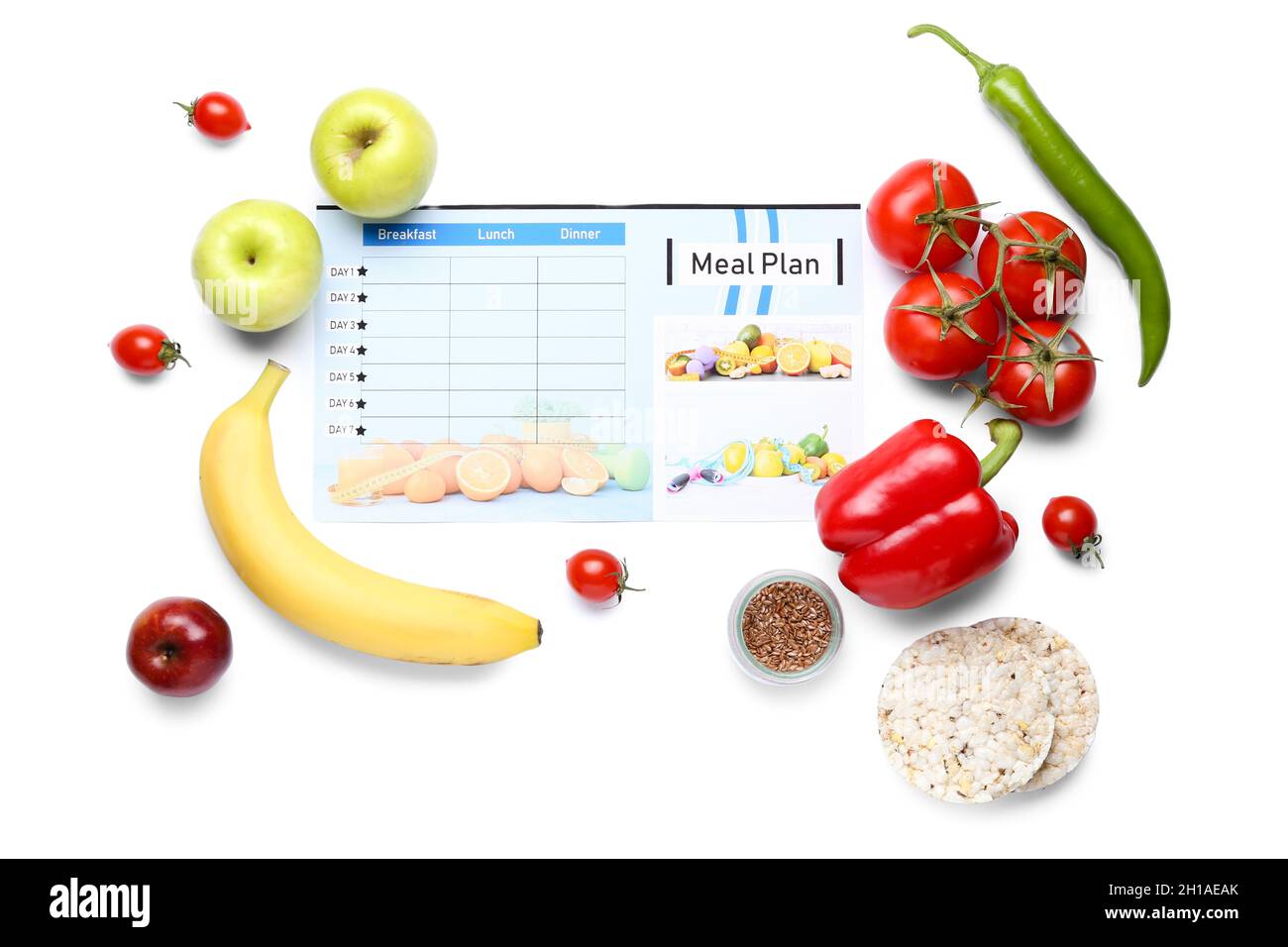 Healthy fresh products with meal plan on white background Stock Photo ...