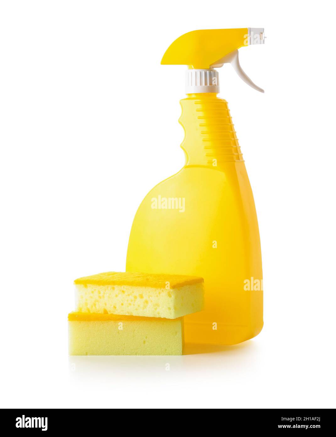 Yellow cleaning sponges and bottle of detergent on white background ...