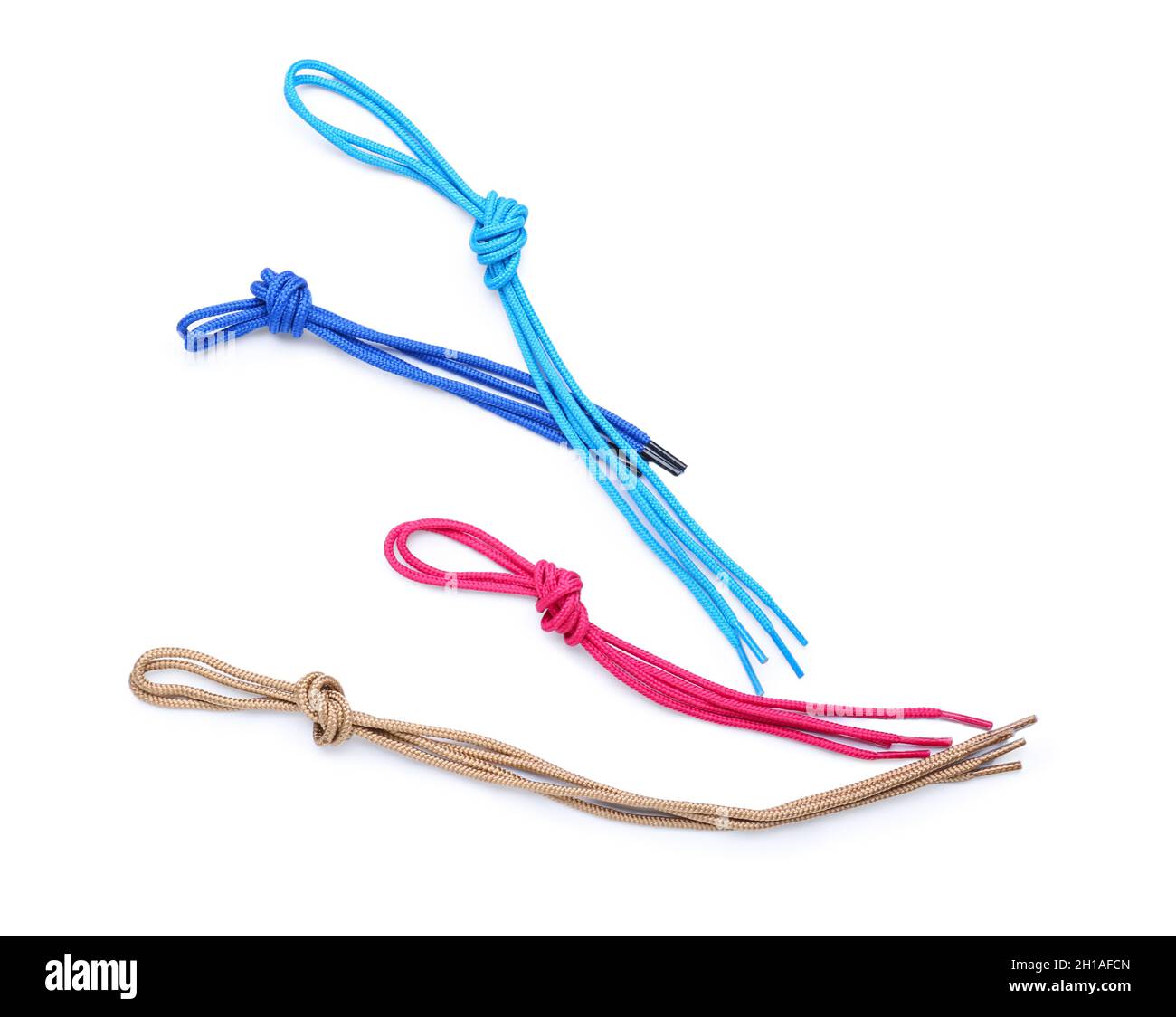 Different shoe laces tied in knots on white background Stock Photo - Alamy