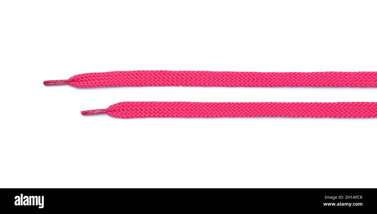 Pink shoe laces isolated on white background Stock Photo - Alamy