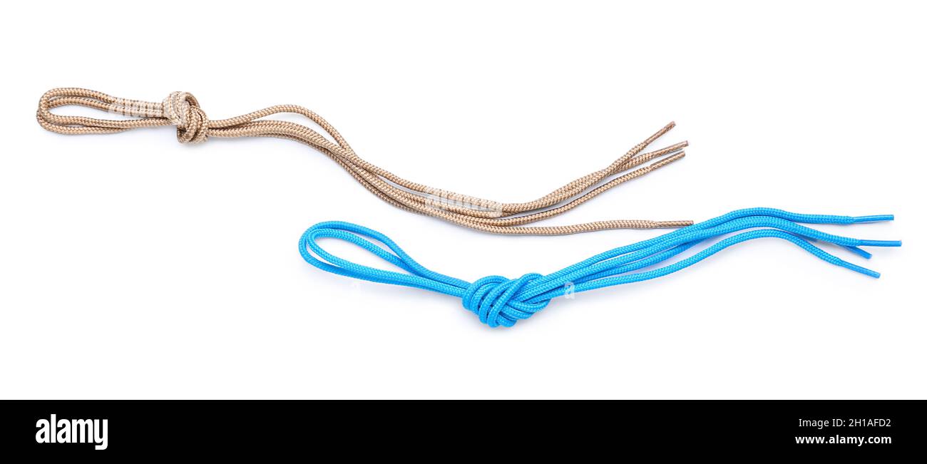 Shoe laces tied in knots on white background Stock Photo - Alamy