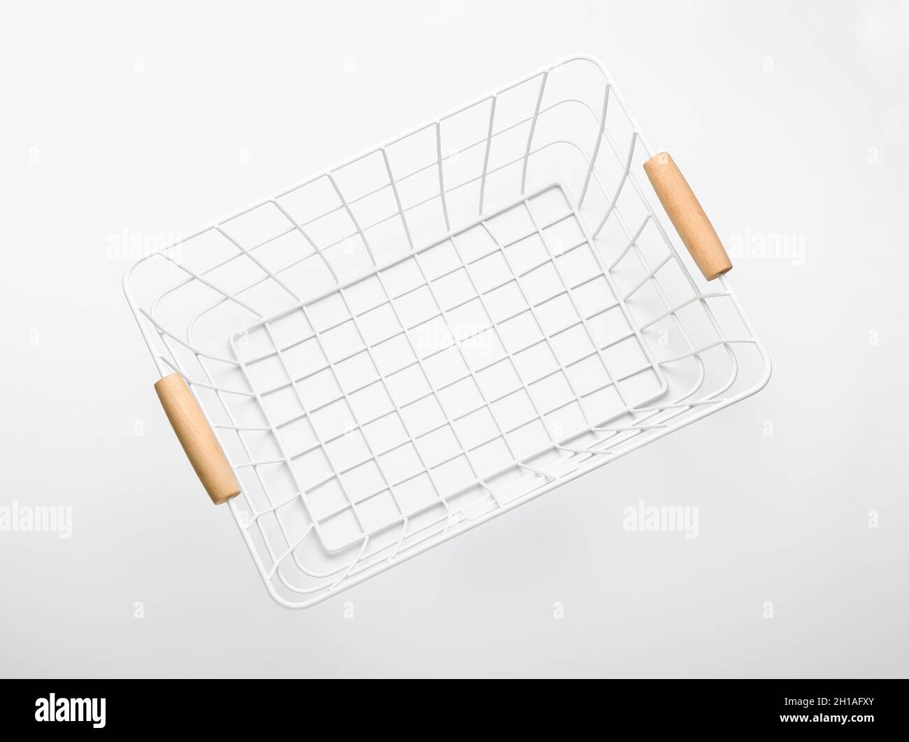 Empty basket isolated on white background Stock Photo - Alamy