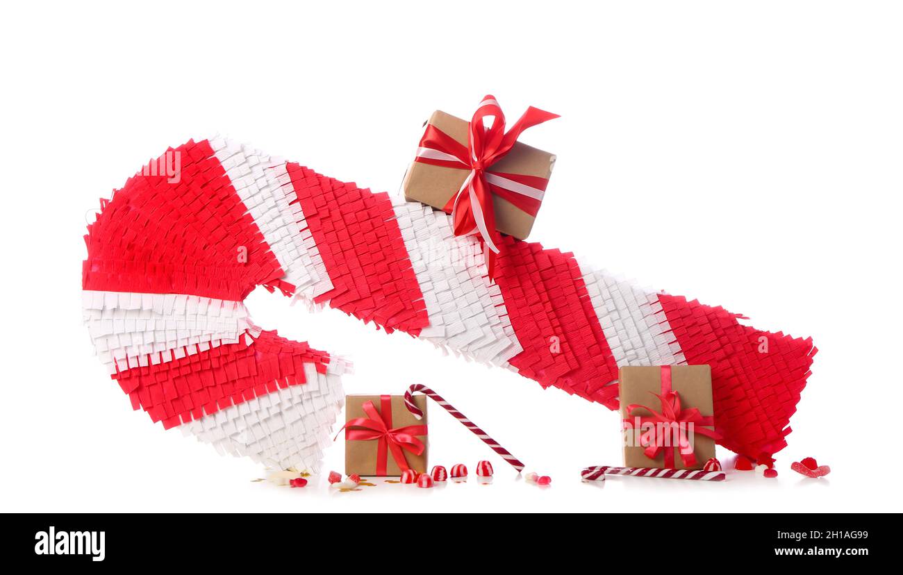 Candy cane pinata and gifts on white background Stock Photo - Alamy