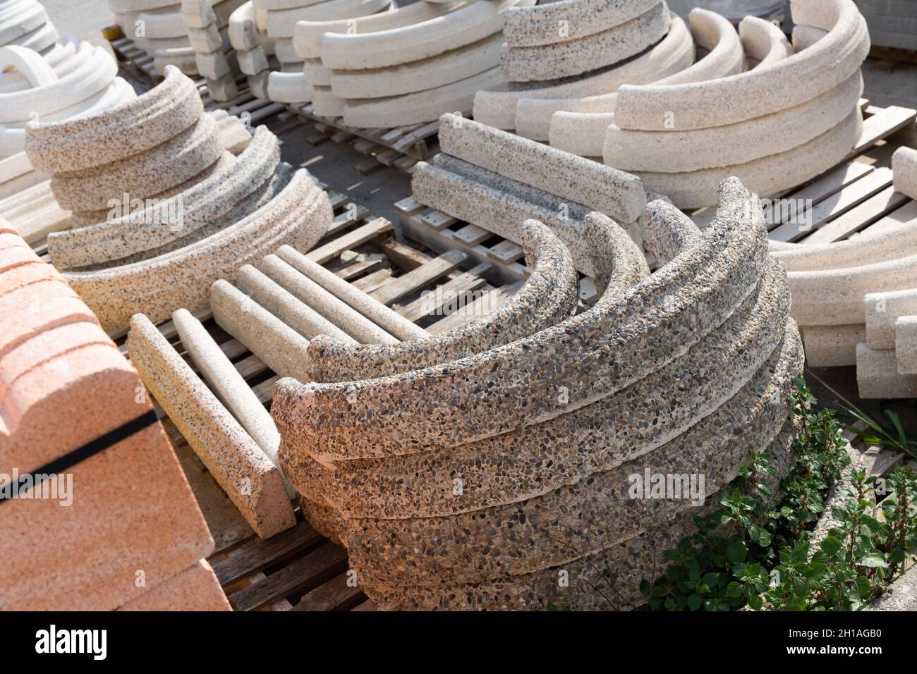 Semicircular rings made of concrete on pallets of hardware store Stock ...