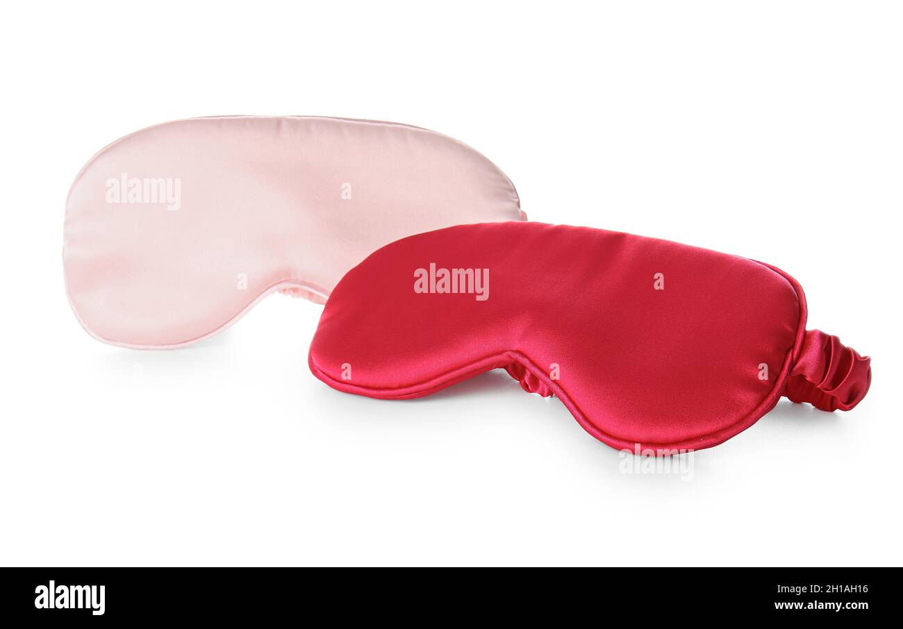 Stylish sleep masks on white background Stock Photo - Alamy