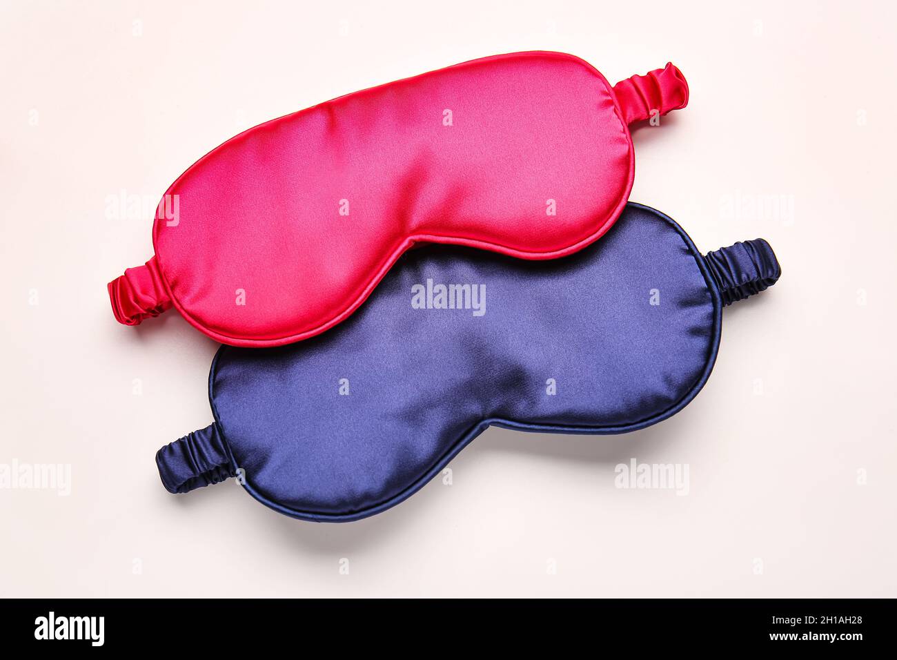 Stylish sleep masks on white background Stock Photo - Alamy