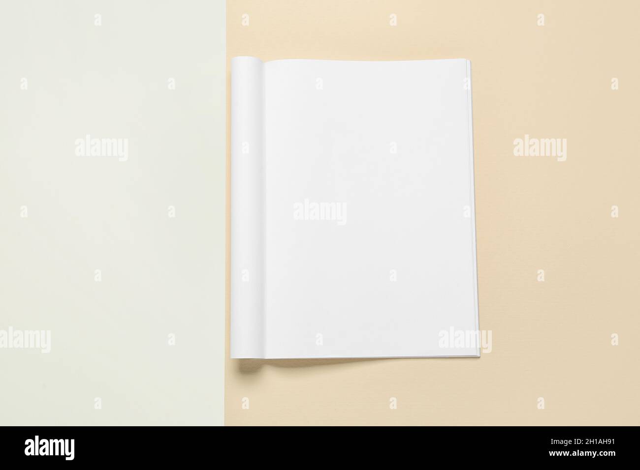 Blank magazine on beige background Stock Photo - Alamy