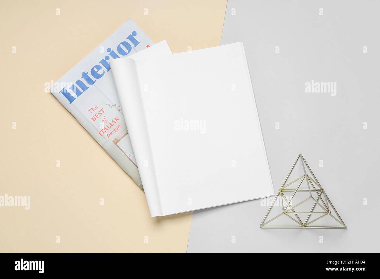 Blank magazine with decor on beige background Stock Photo - Alamy