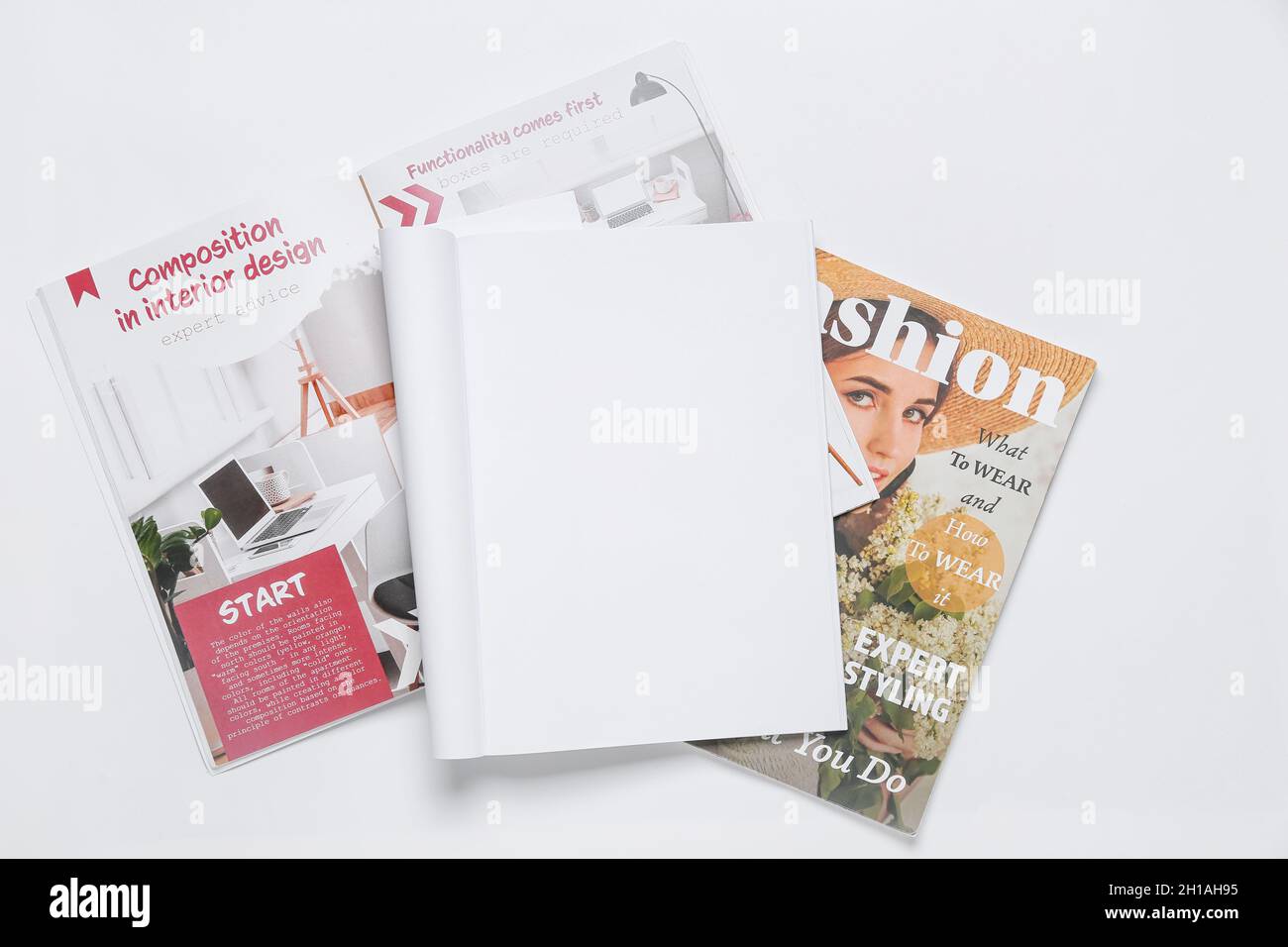 Different magazines on light background Stock Photo - Alamy