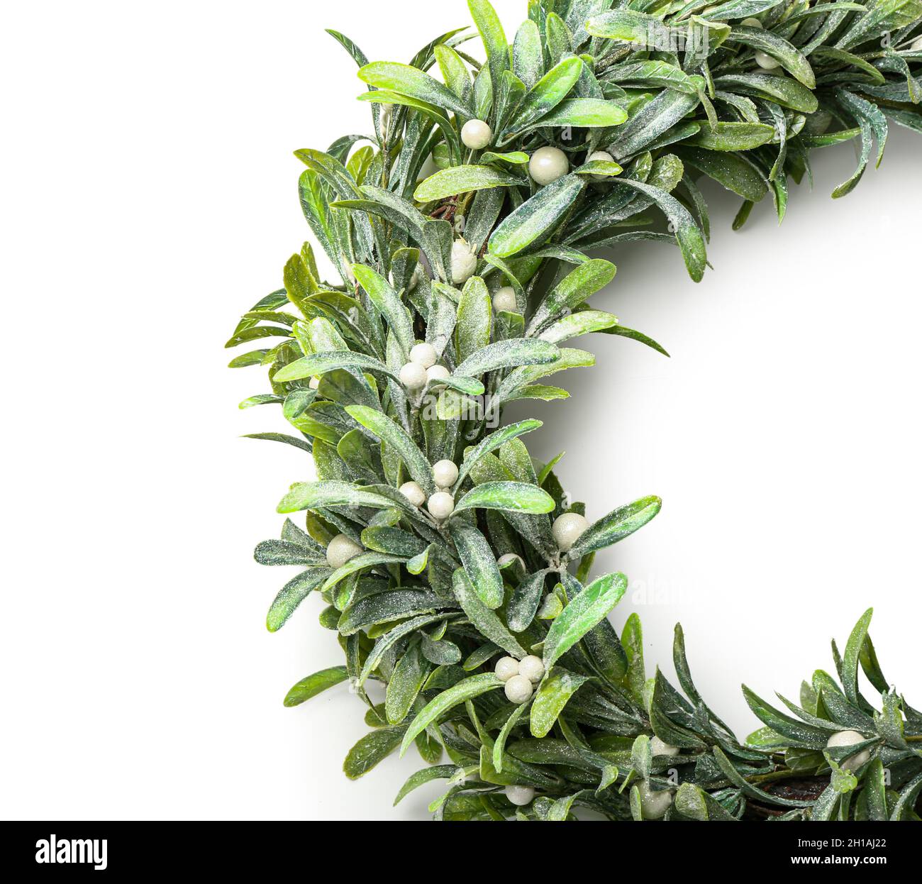 Simple mistletoe wreath on white background Stock Photo - Alamy