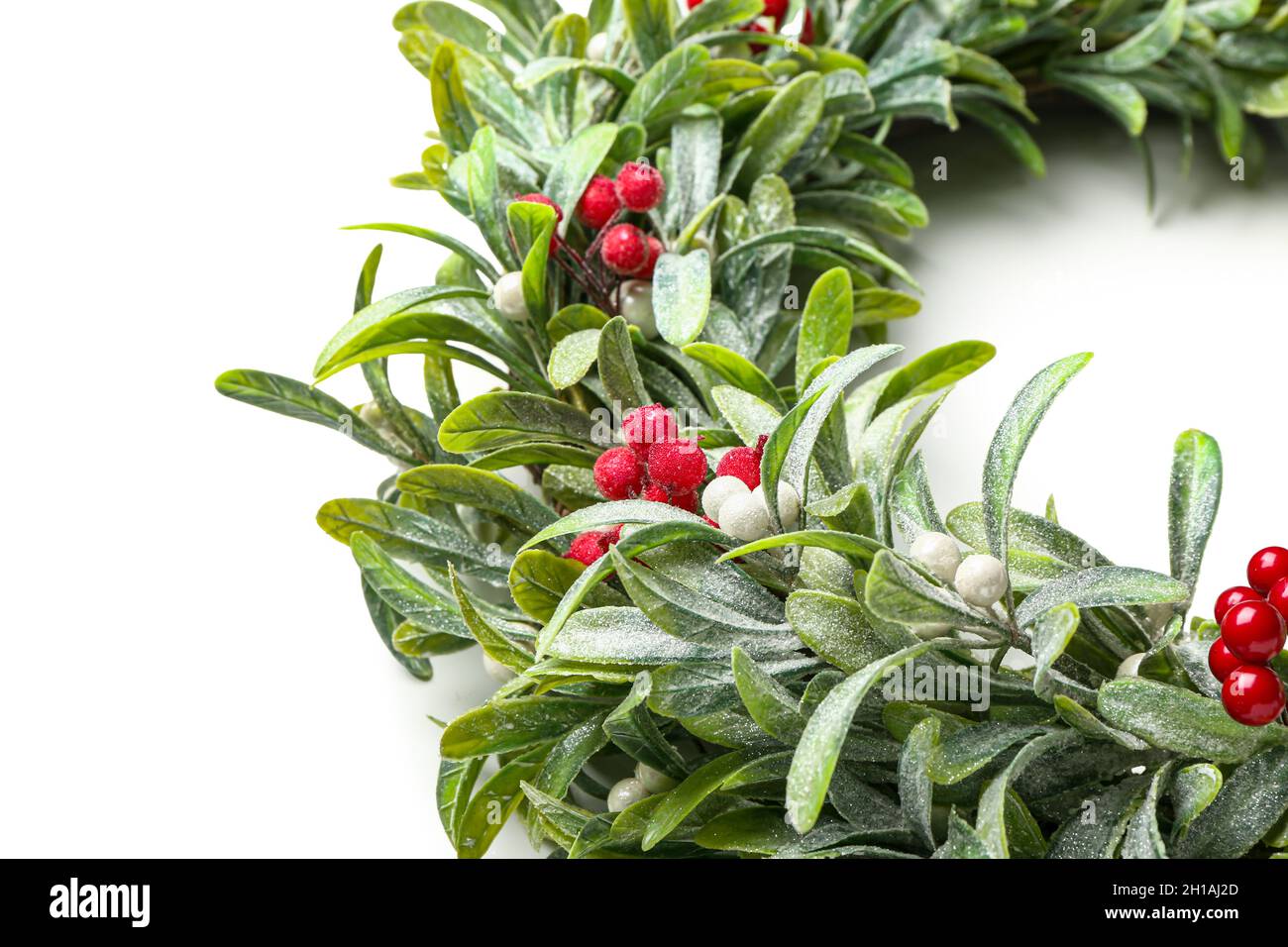 Beautiful mistletoe wreath on white background Stock Photo - Alamy