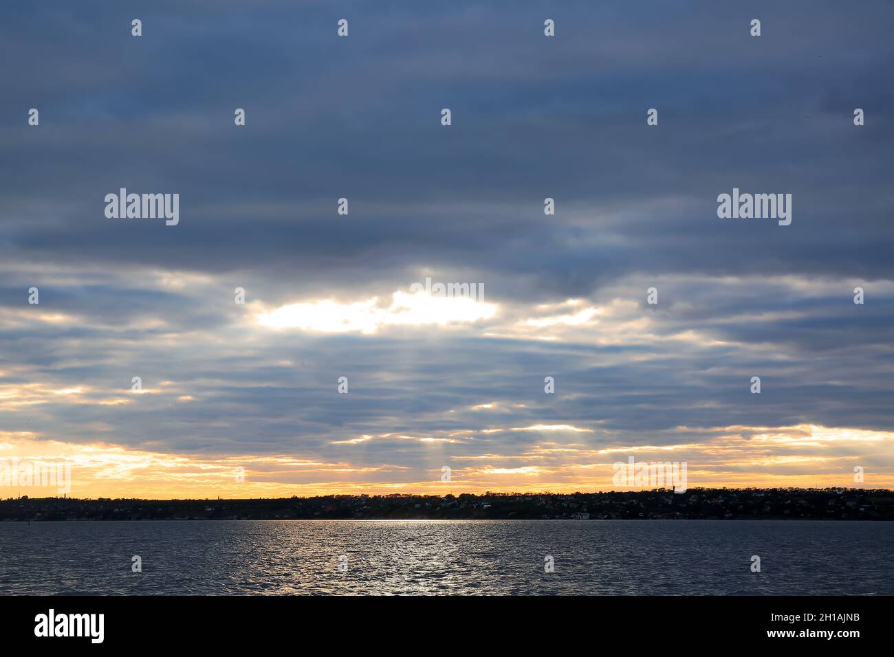 Beautiful cloudy sky over river Stock Photo - Alamy