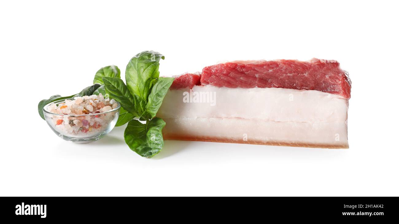 Uncooked bacon with spices on white background Stock Photo - Alamy