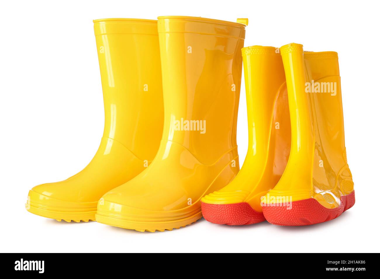 Yellow rubber boots on white background Stock Photo - Alamy