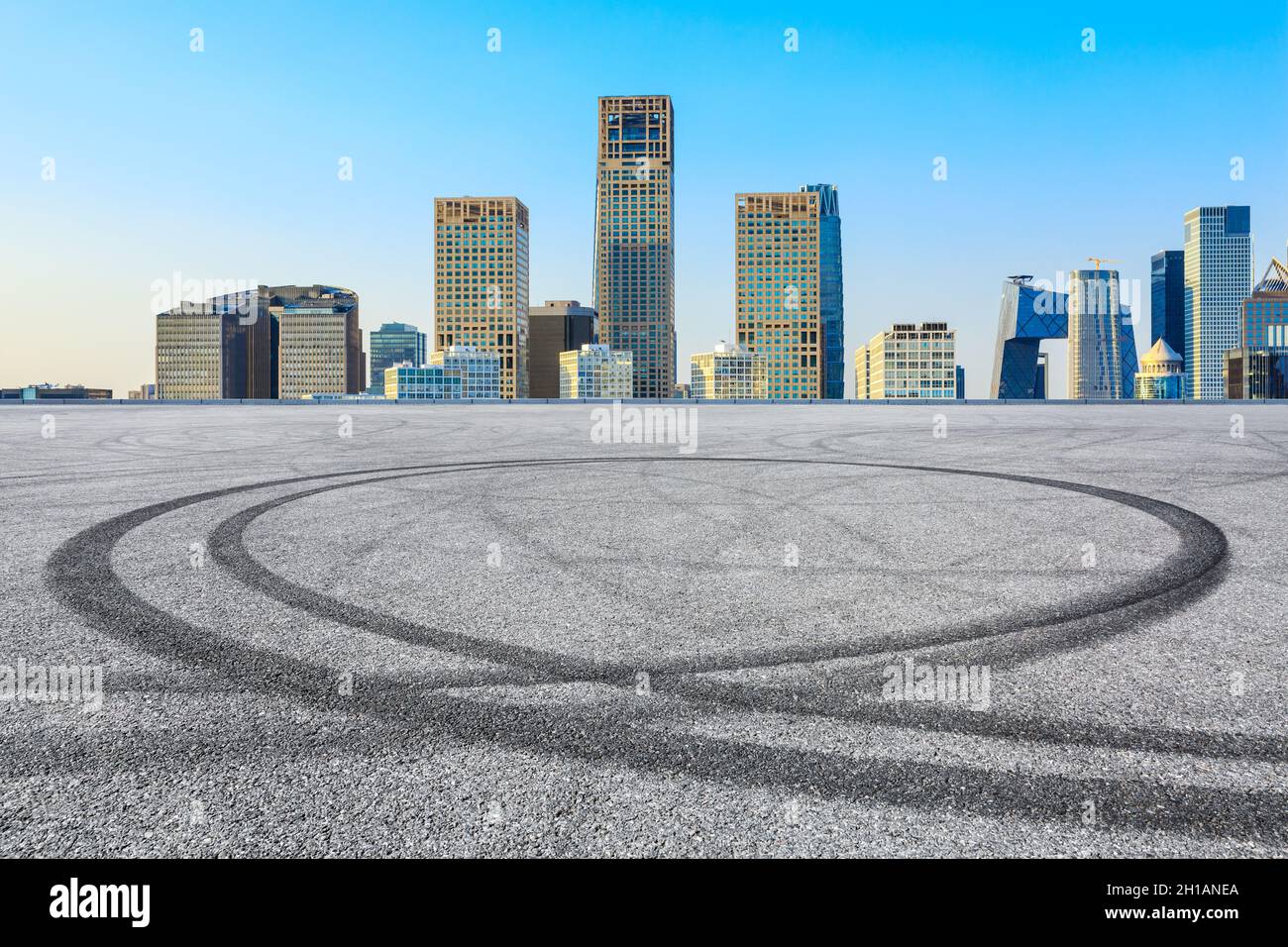 Asphalt road ground and modern city commercial buildings in Beijing ...