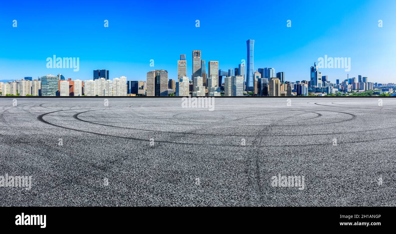 Asphalt road ground and modern city commercial buildings in Beijing ...