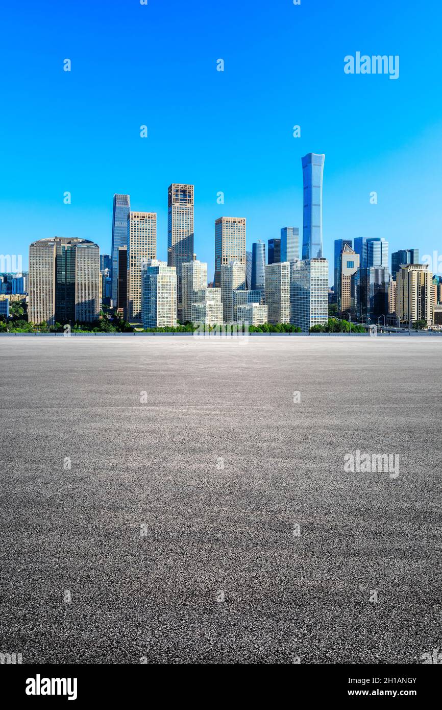 Asphalt road ground and modern city commercial buildings in Beijing ...