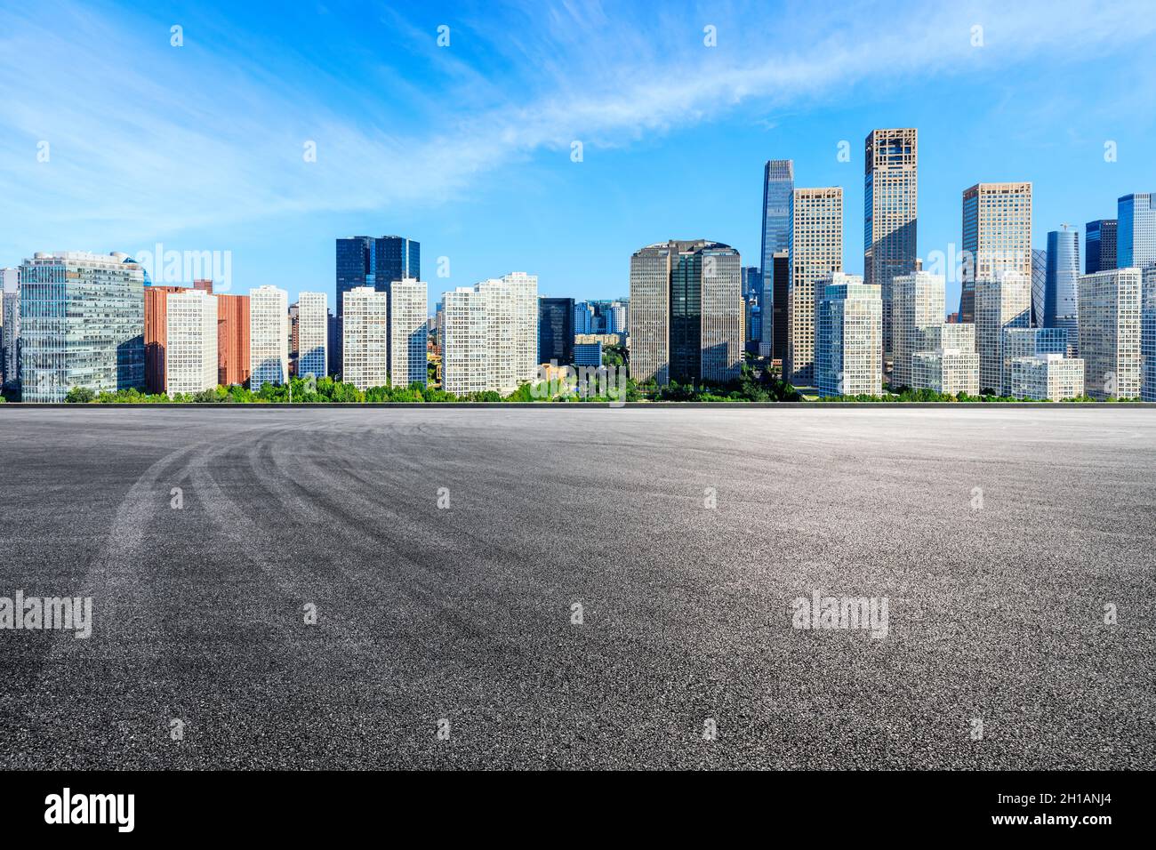 Asphalt road ground and modern city commercial buildings in Beijing ...