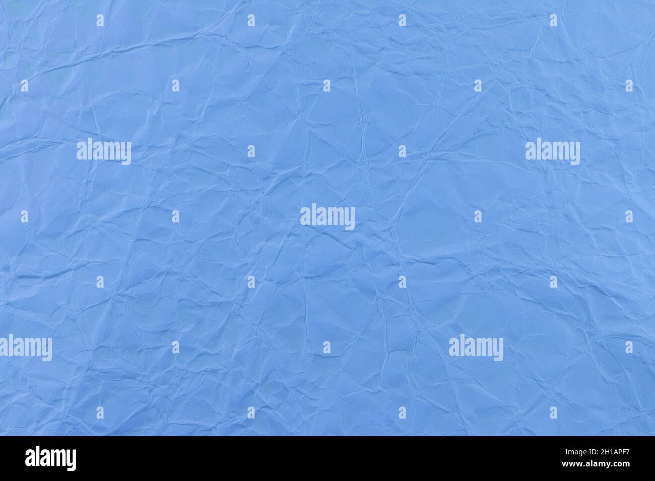 Blue wrinkled paper use for background Stock Photo - Alamy