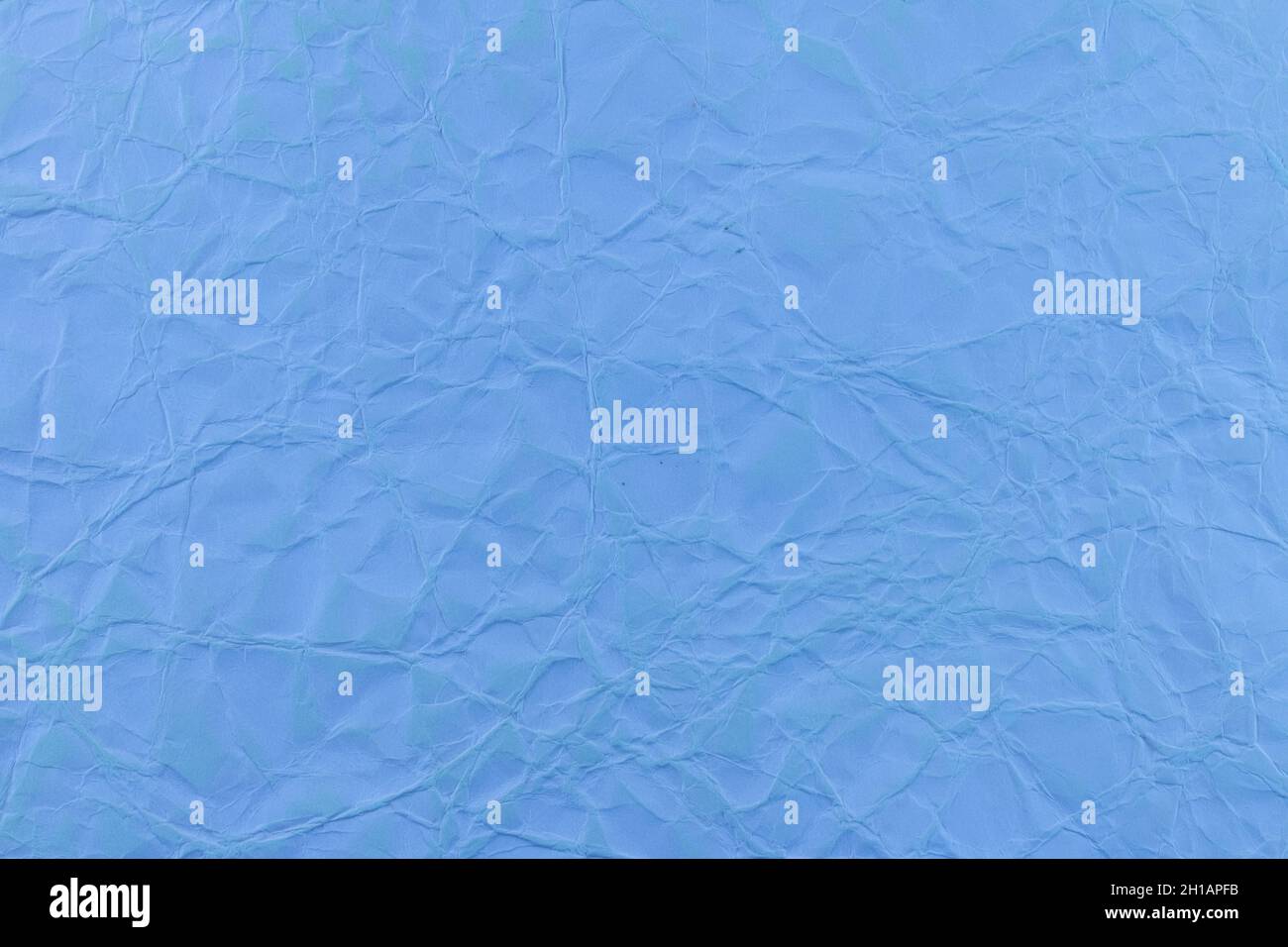 Blue wrinkled paper use for background Stock Photo - Alamy