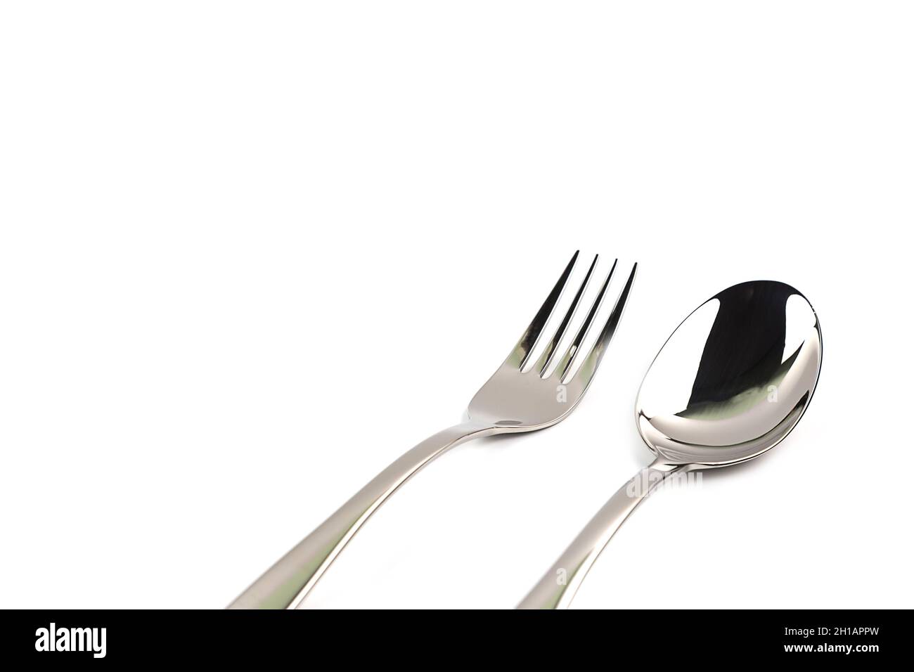 fork and spoon isolated on white background Stock Photo - Alamy
