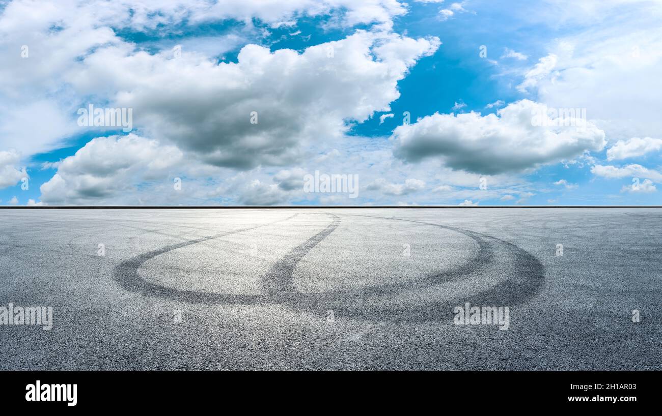 Asphalt race track road and sky clouds.Road ground background Stock ...