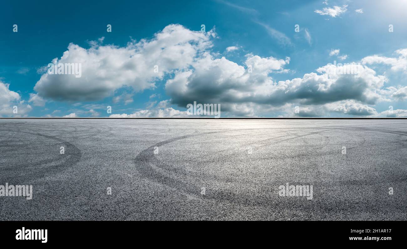 Asphalt race track road and sky clouds.Road ground background Stock ...