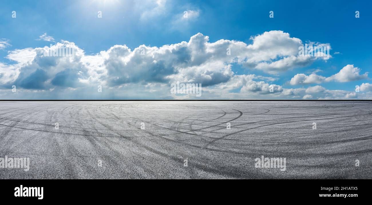 Asphalt race track road and sky clouds.Road ground background Stock ...