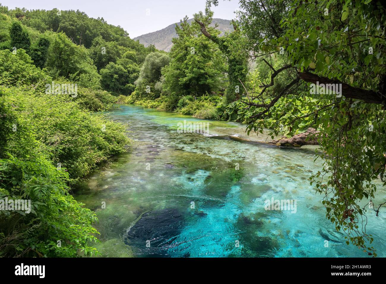 Beautiful turquoise spring Blue Eye or Syri i Kalter near Muzine town ...