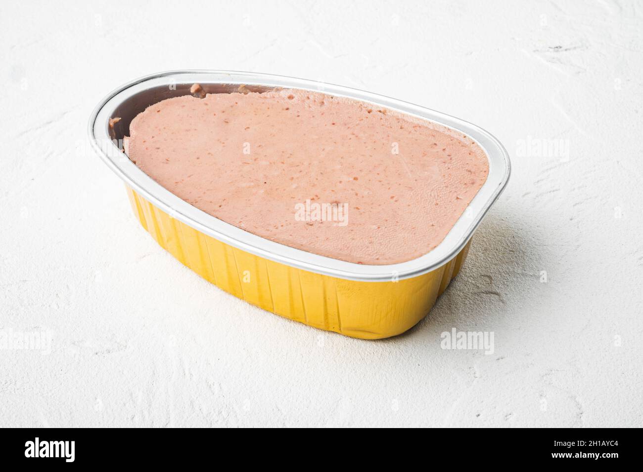 Chicken pate in can set, on white stone table background Stock Photo ...