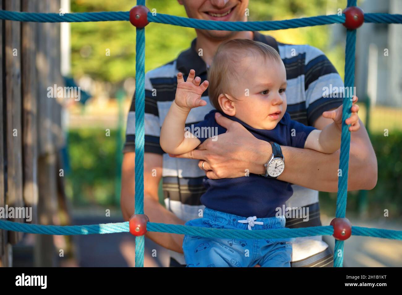 Boy holding rope hi-res stock photography and images - Alamy