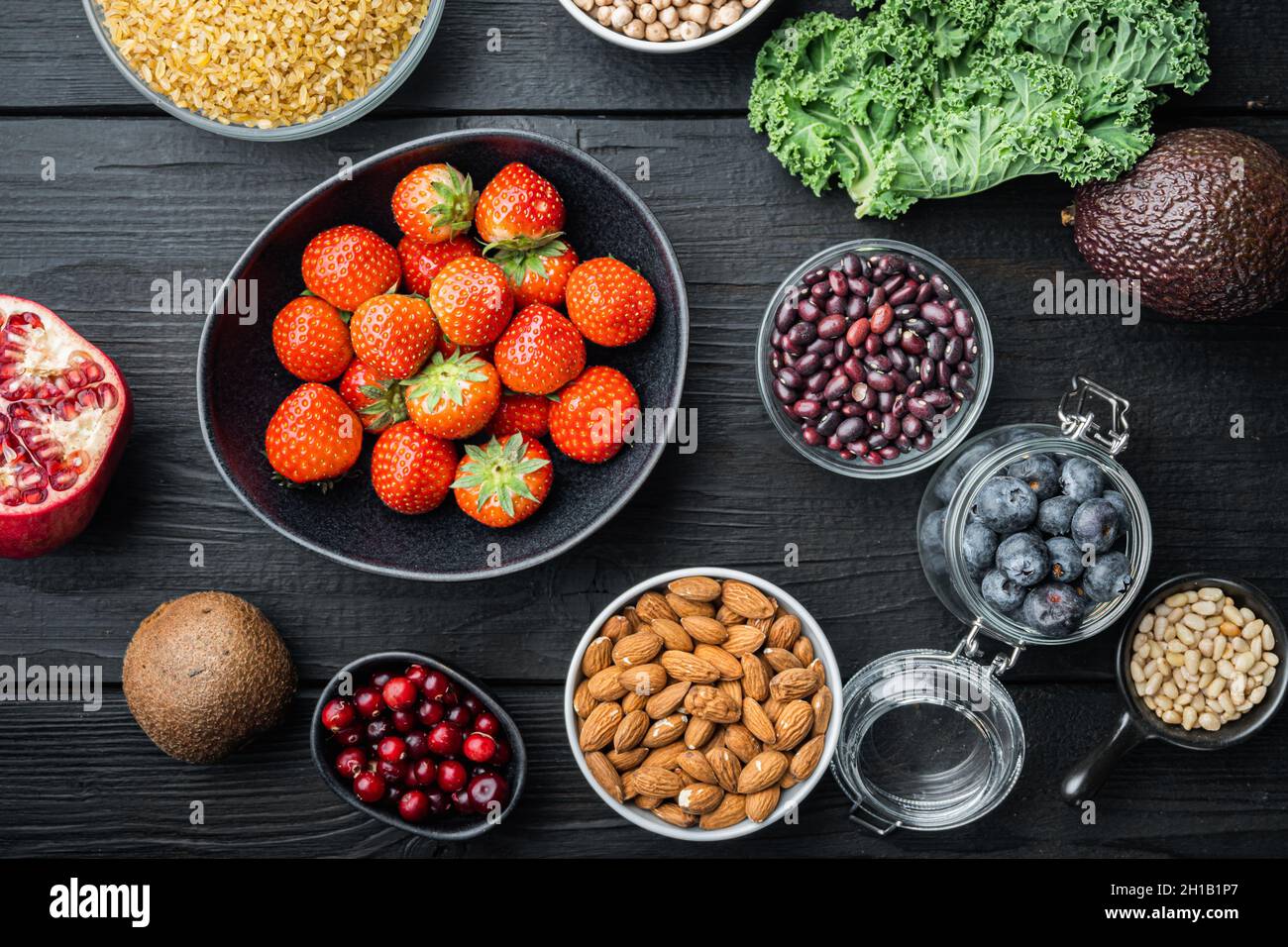 Healthy diet eating and meal planning, flat lay, on black wooden ...