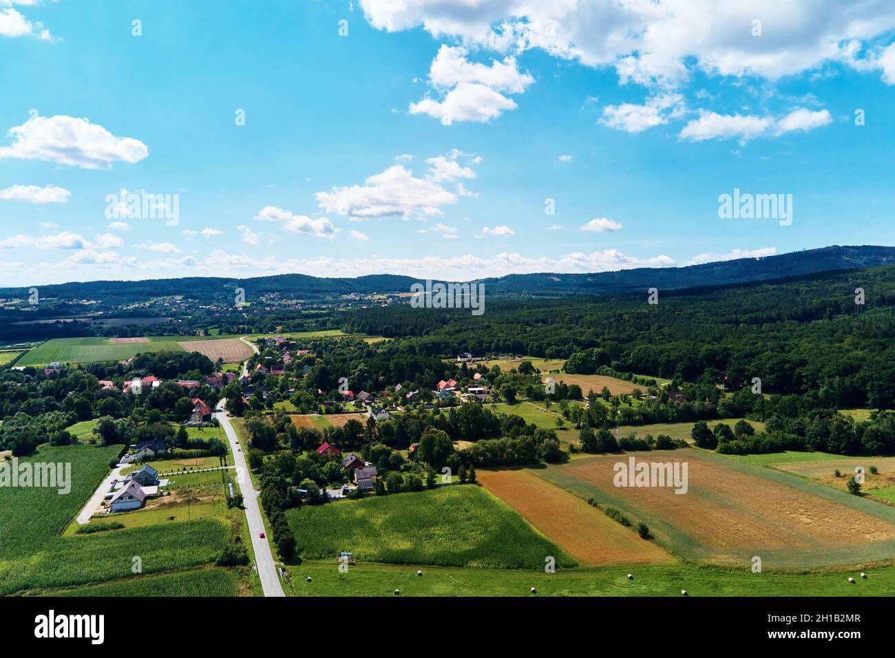 Mountain village with forests, bird eye view. Sleza mountain landscape ...
