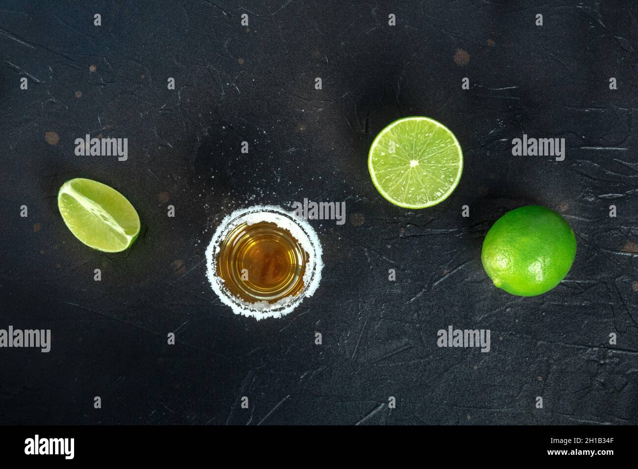 Tequila shot with limes, a Mexican drink with a salt rim, shot from ...
