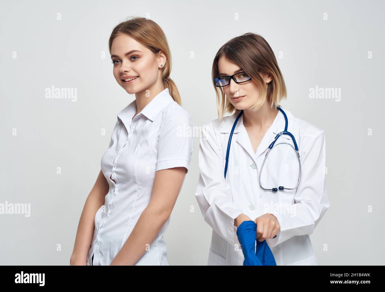 doctor stethoscope healing procedures light background Stock Photo - Alamy