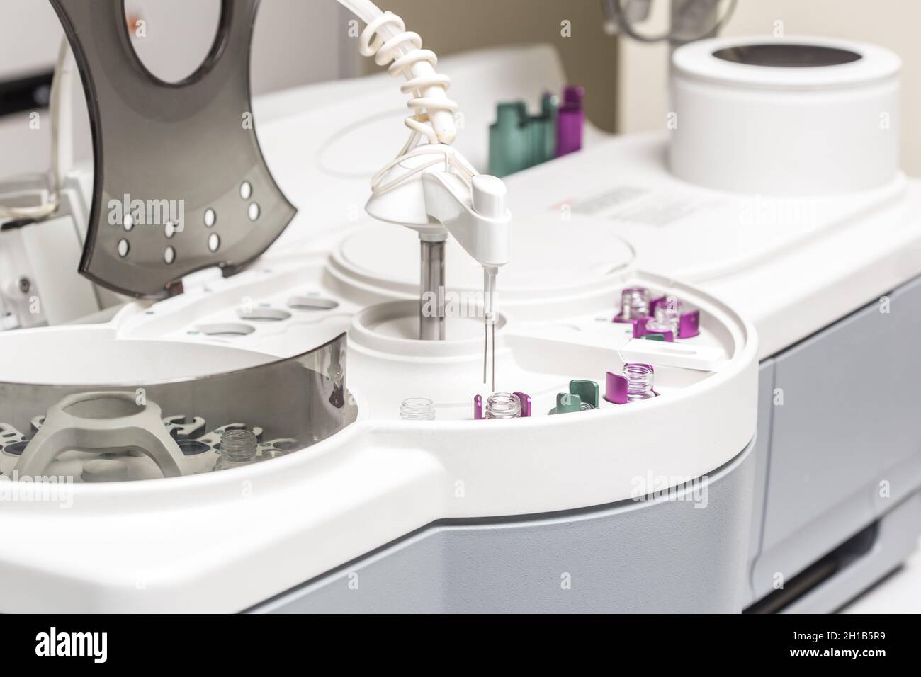 Small tube to machine in laboratory Stock Photo - Alamy