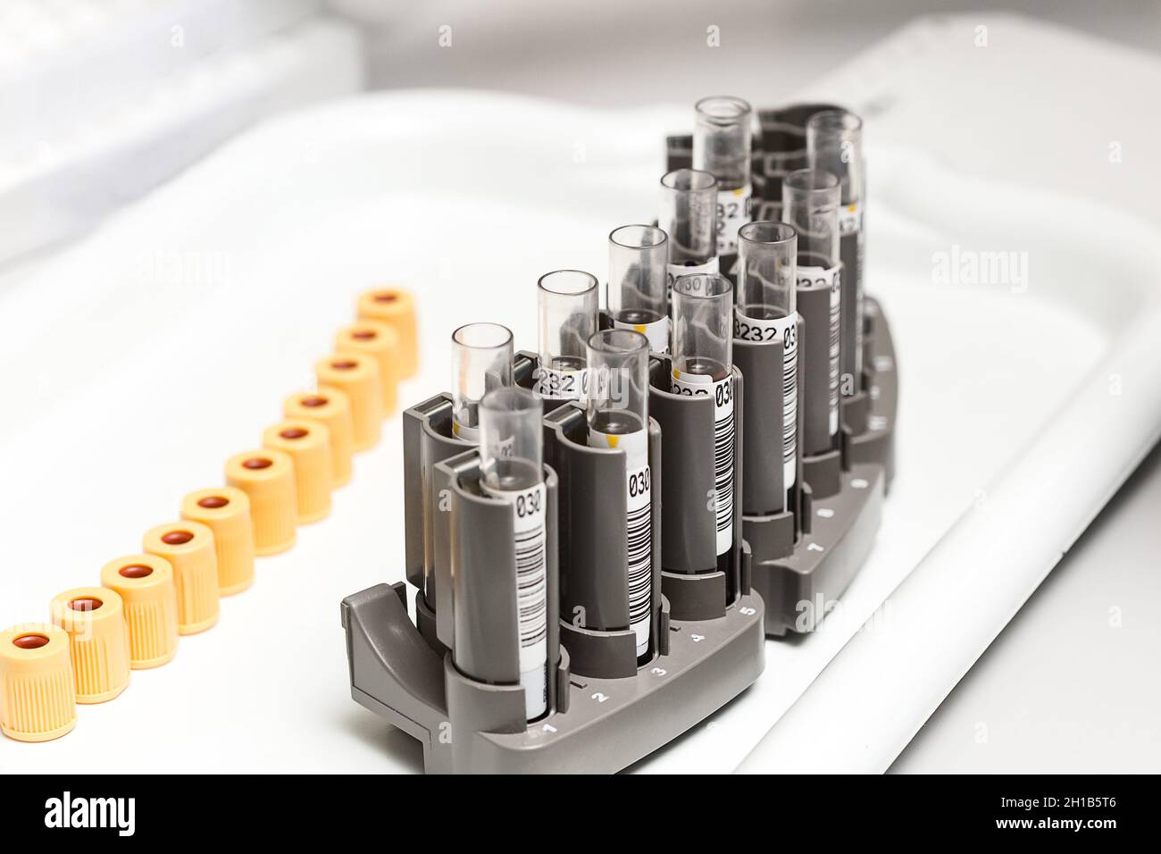 A chemical sample bottle. Centrifuge. A test tube vial sets for ...
