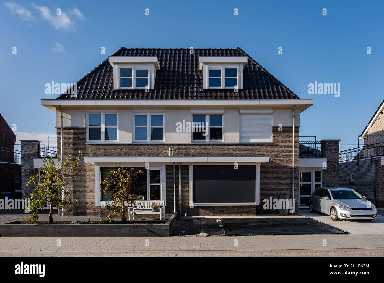 Dutch Suburban area with modern family houses, newly build modern ...