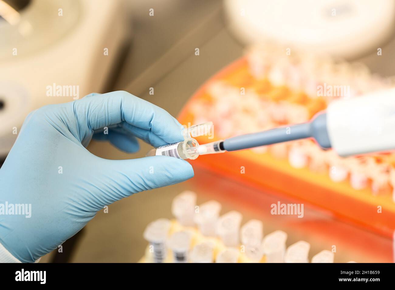 A chemical sample bottle. Centrifuge. A test tube vial sets for ...