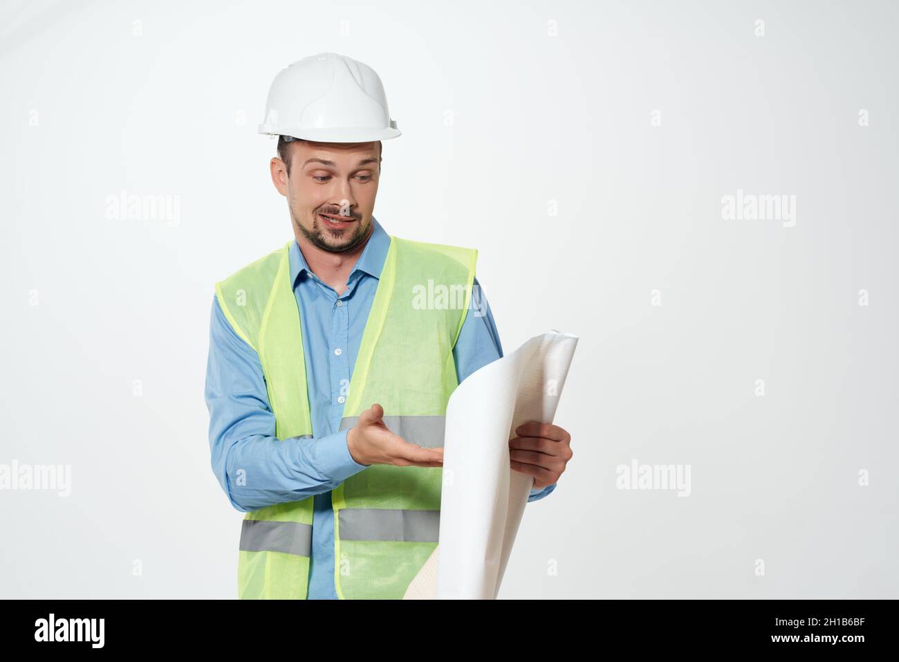 male builders blueprints builder isolated background Stock Photo - Alamy