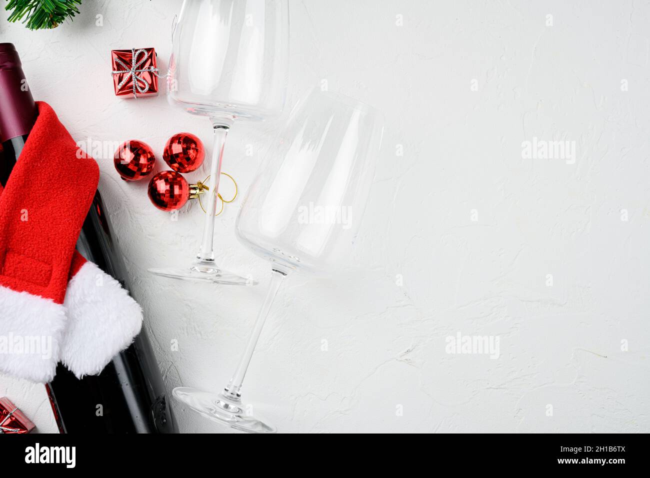 Christmas tree branches wine set, on white stone table background, top ...
