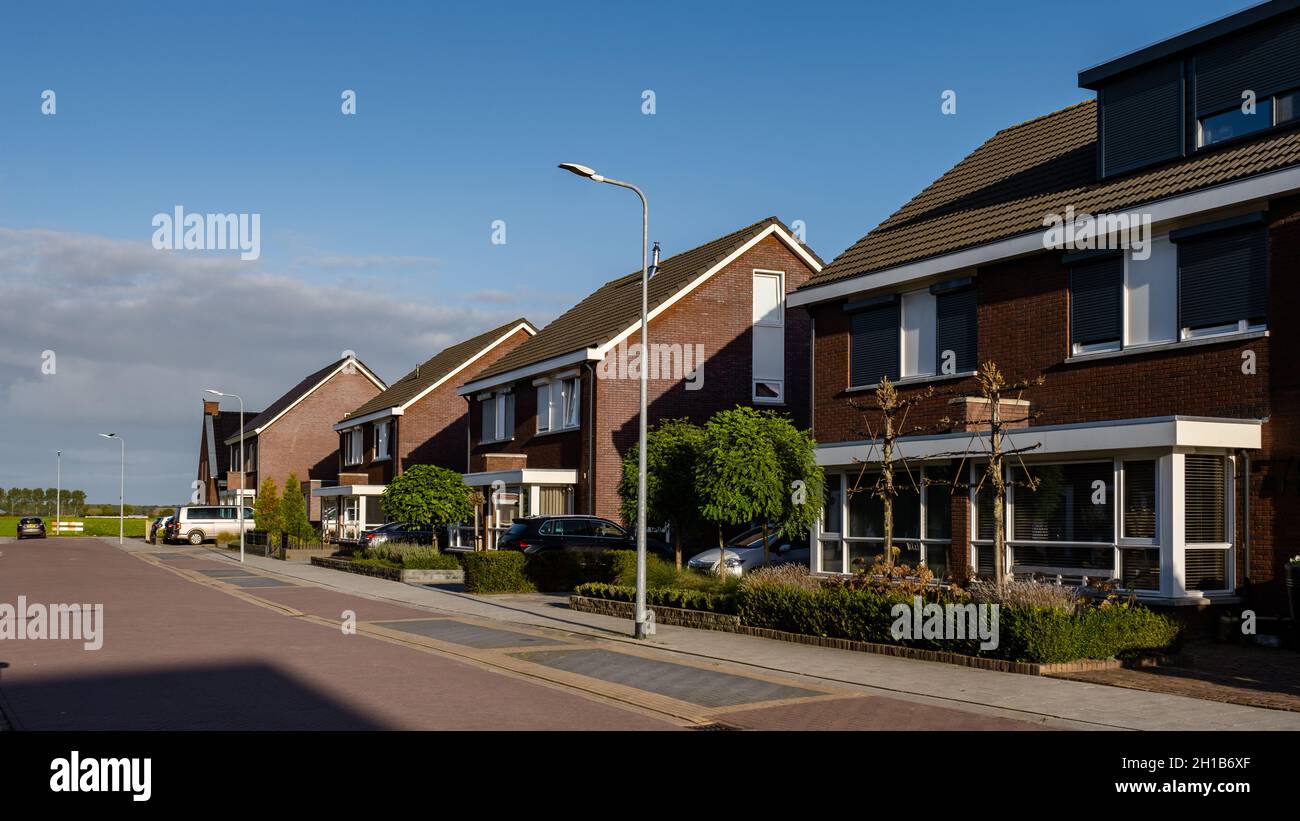 Dutch Suburban area with modern family houses, newly build modern ...