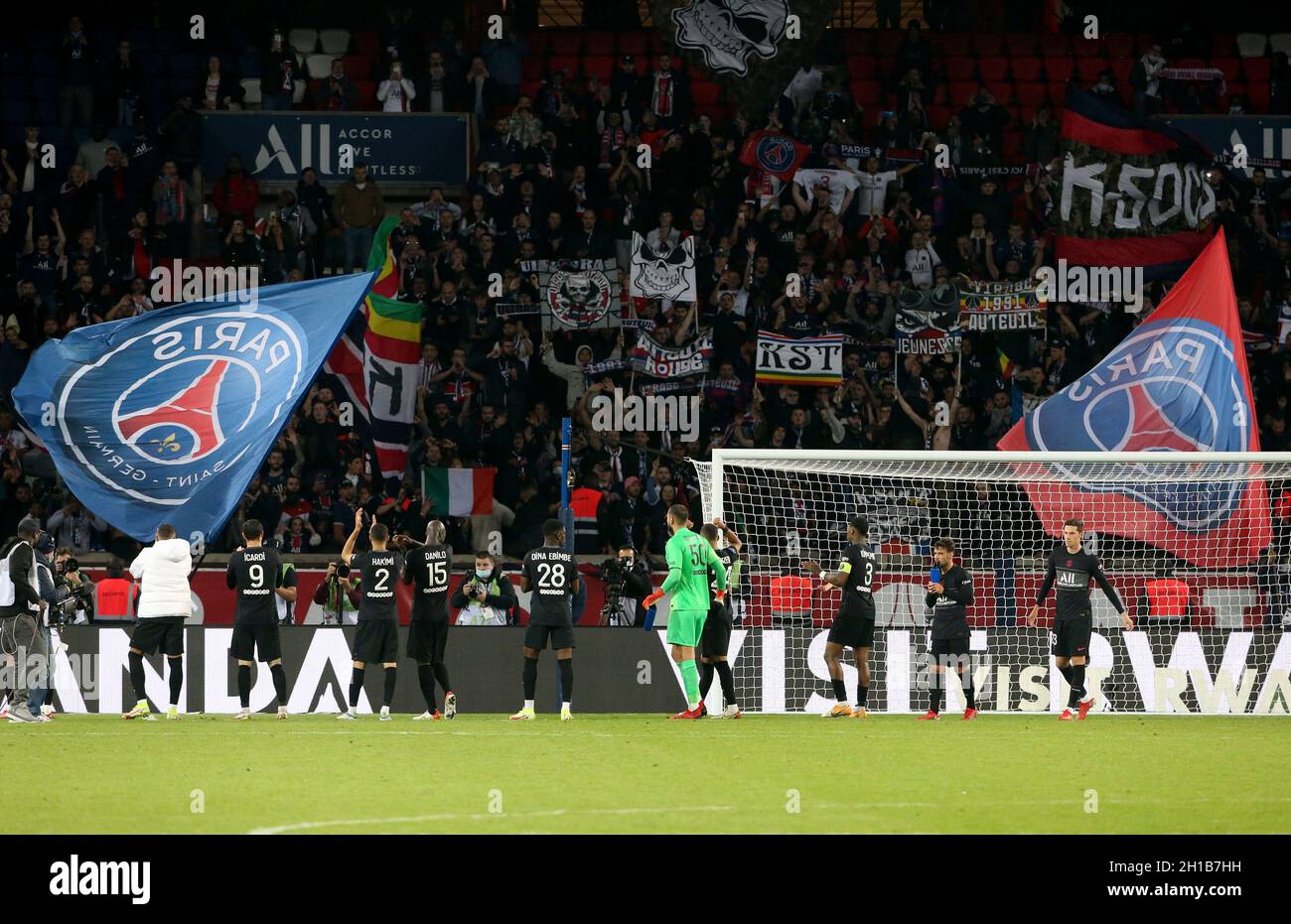 Players of PSG celebrate the victory following the French championship ...