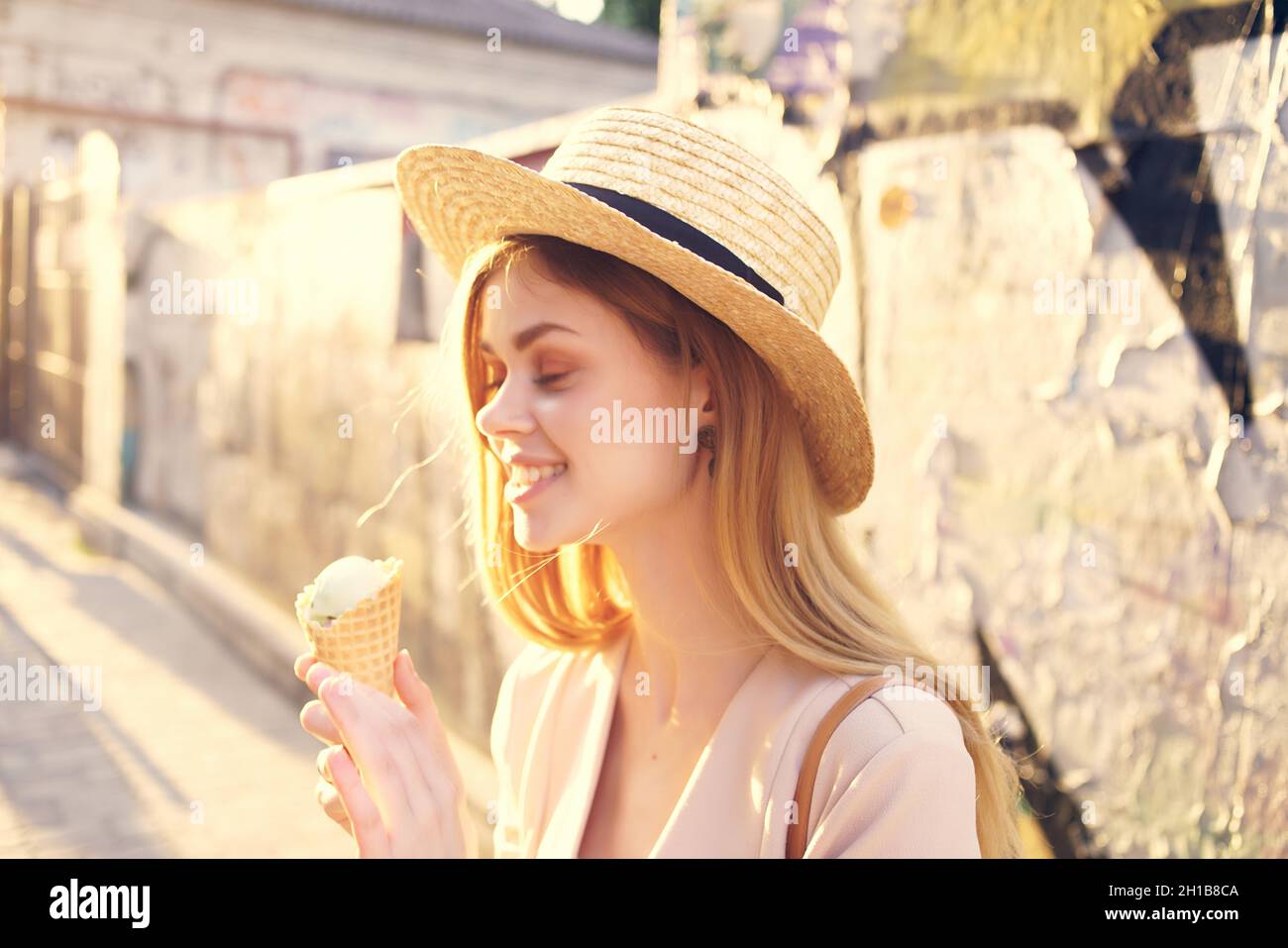 beautiful woman outdoor walk eat ice cream walk travel fun Stock Photo ...