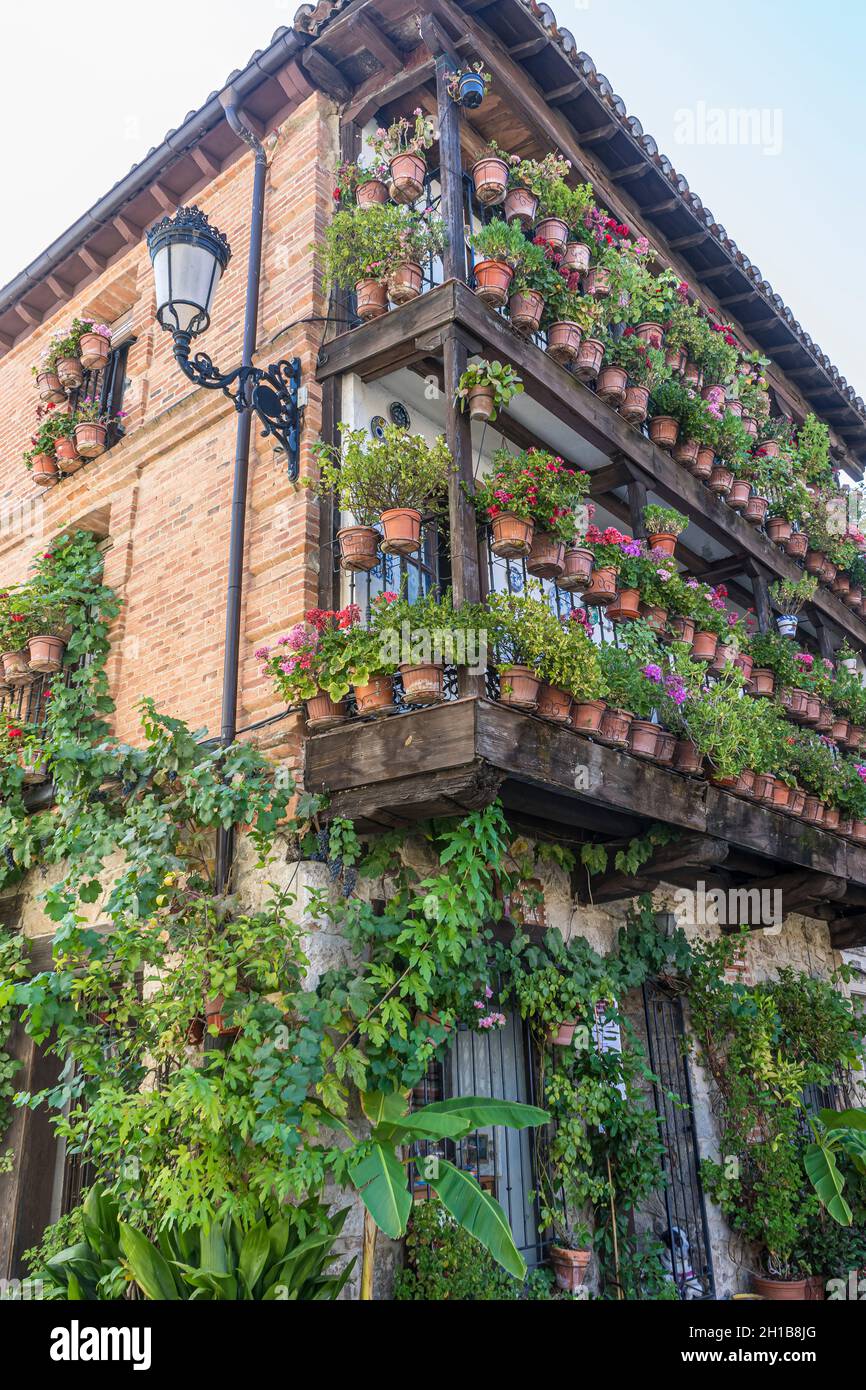 Travel, Facade of old building with flower pots. Tourism in central ...