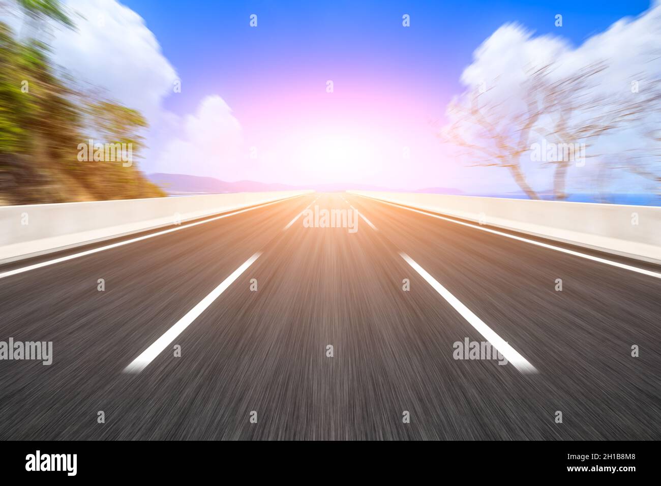Motion blurred Mountain road landscape Stock Photo - Alamy