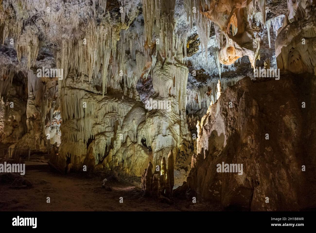 Formation of stalactites and stalagmites inside an ancient cave Stock ...
