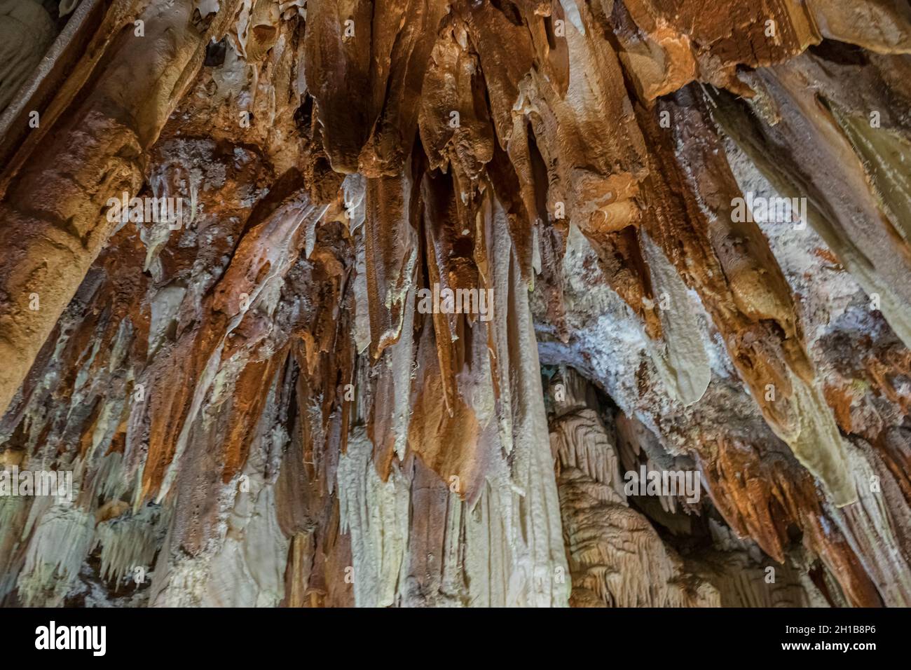 Formation of stalactites and stalagmites inside an ancient cave Stock ...