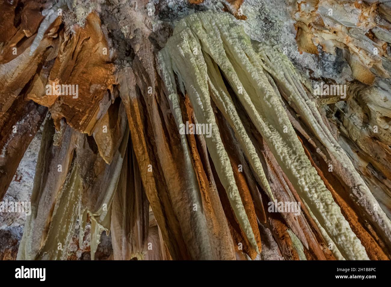 Formation of stalactites and stalagmites inside an ancient cave Stock ...