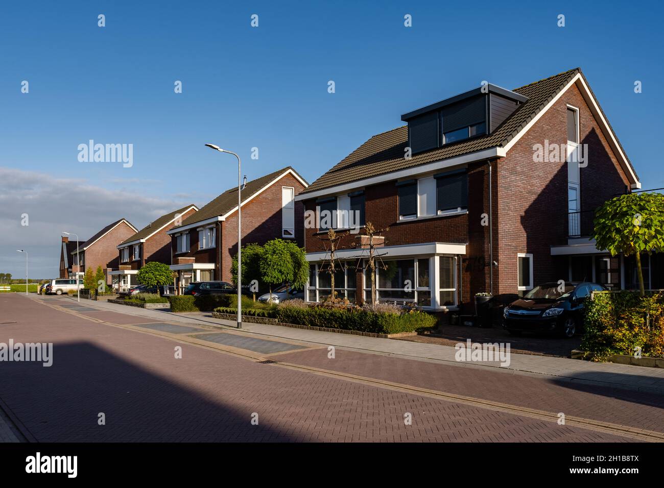 Dutch Suburban area with modern family houses, newly build modern ...